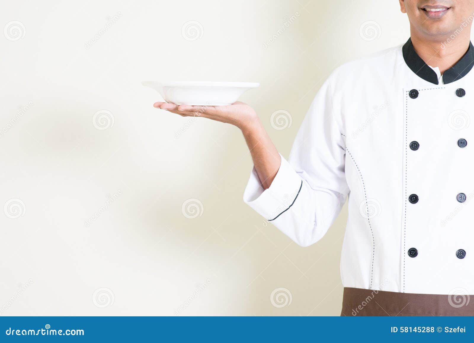 Indian Male Chef in Uniform Holding an Empty Plate Stock Photo - Image ...