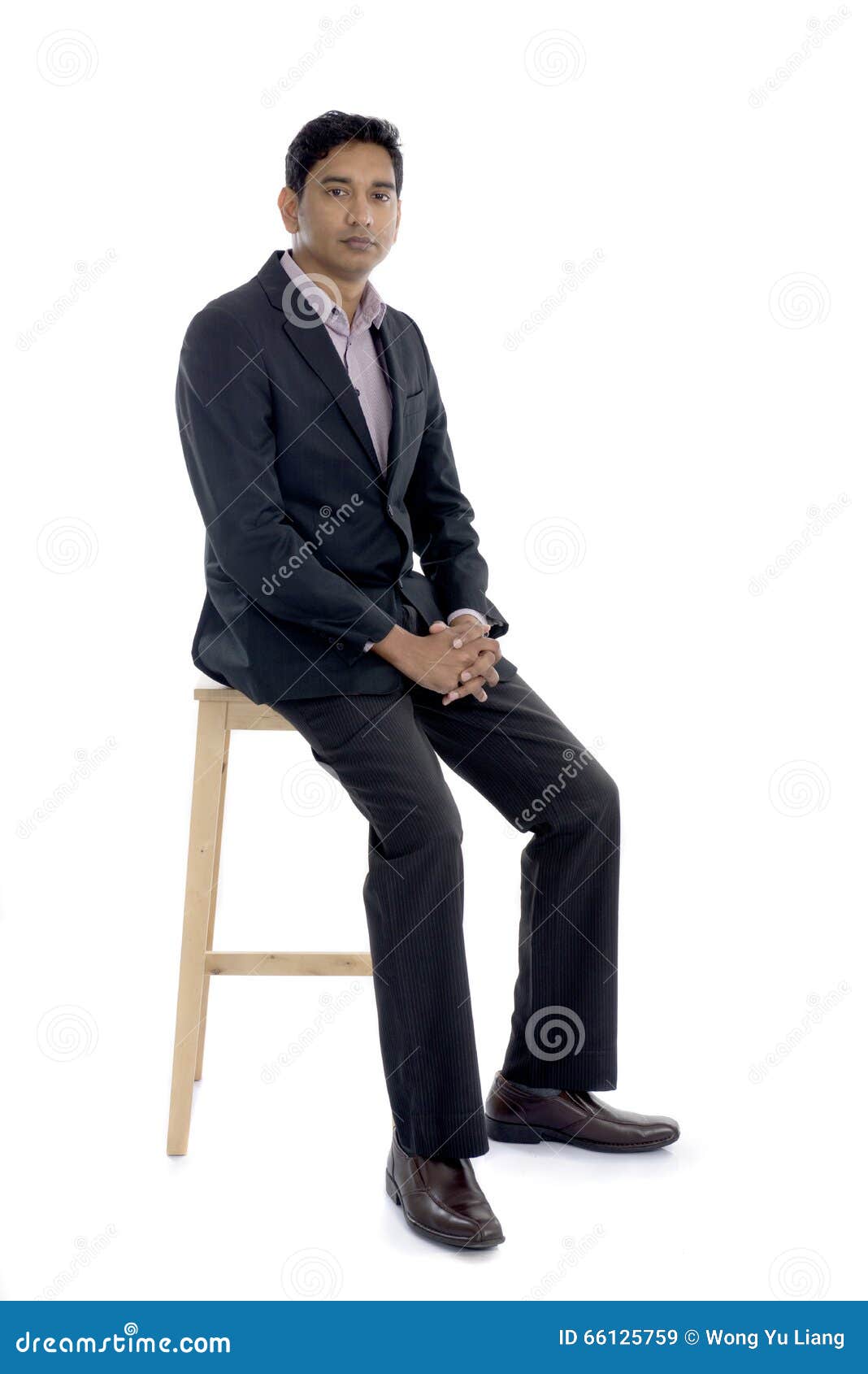 Indian Male Sitting on Chair Stock Image - Image of studio, white: 66125759