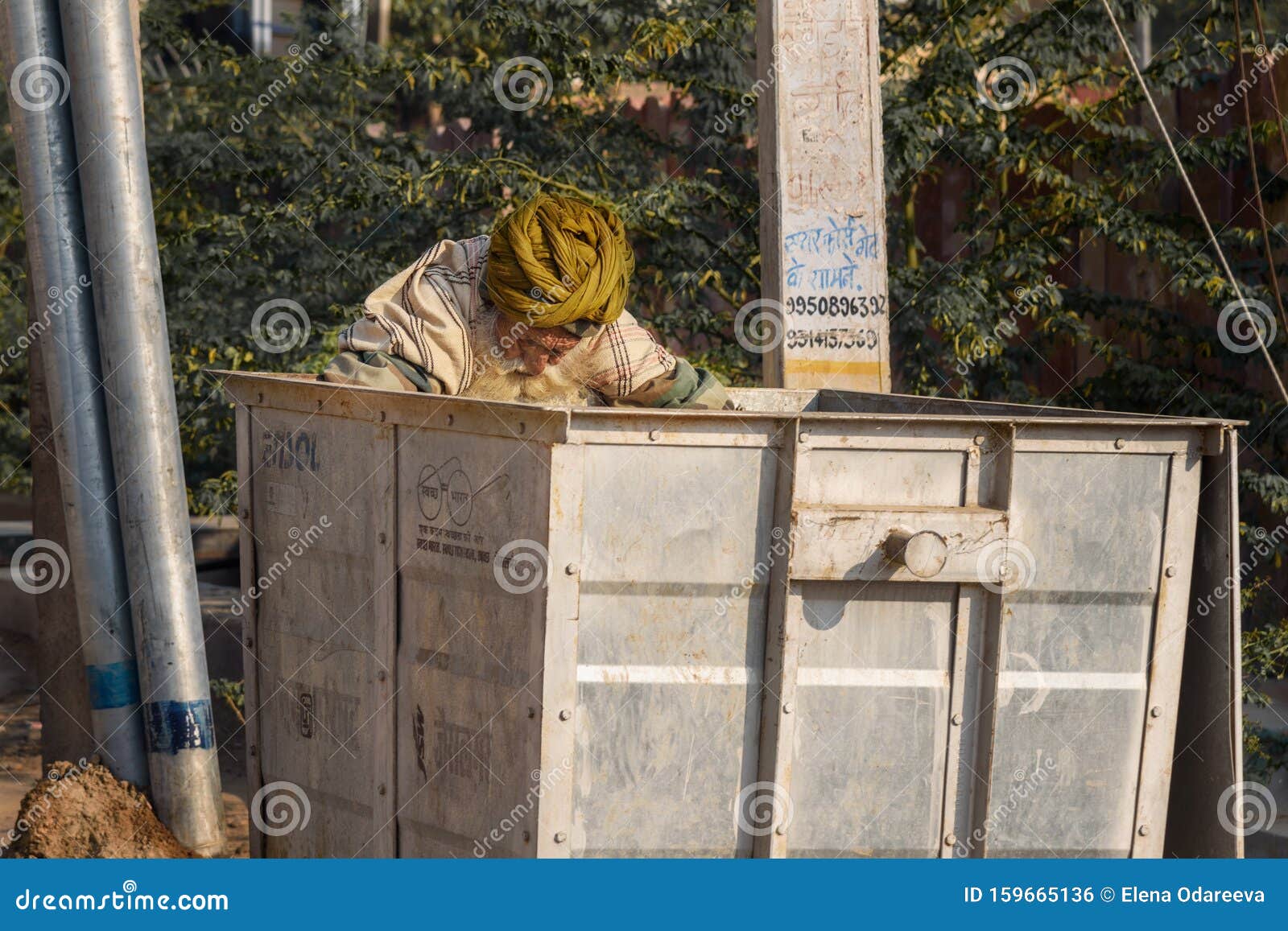 Indian Man Digging in Trash Bin in Jaisalmer. India Editorial Photo ...