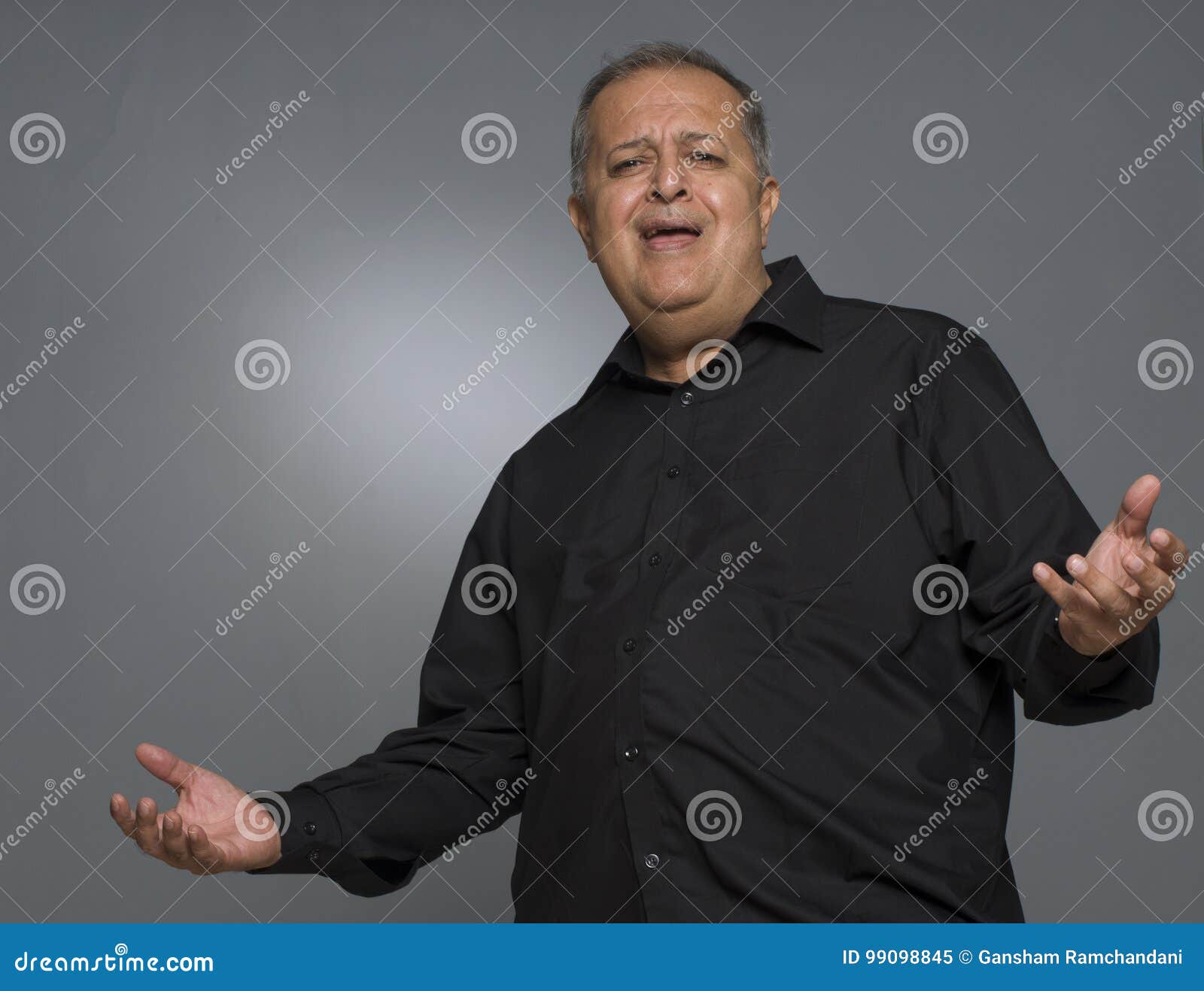 Indian man speaking stock image. Image of fifty, talking - 99098845