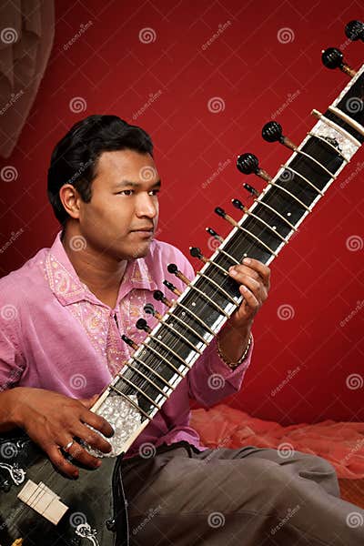 Indian Man Playing Sitar stock image. Image of perform - 19032857