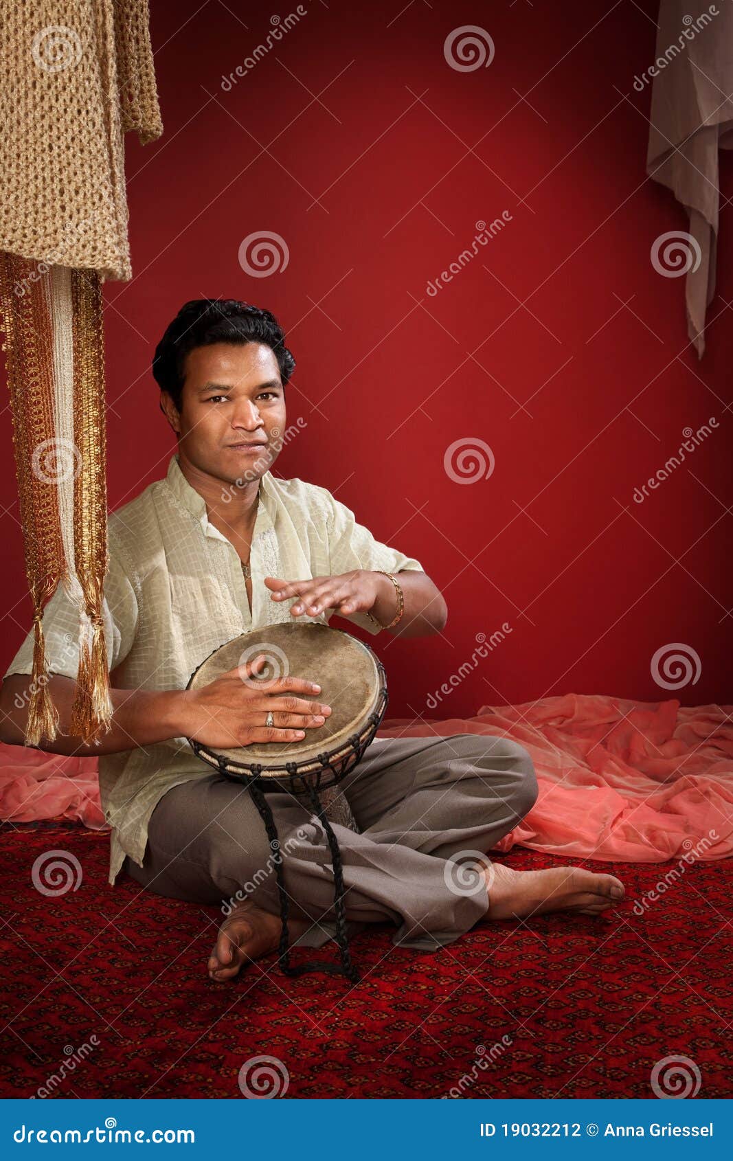 Young Tabla Player Stock Image | CartoonDealer.com #19032361