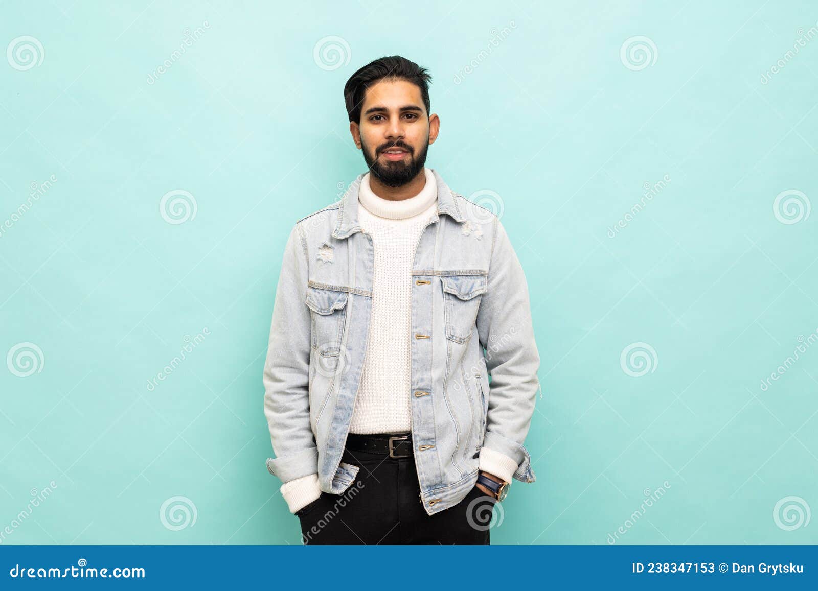 Smiling Indian Man Standing in Front of Turquoise Wall Stock Image ...