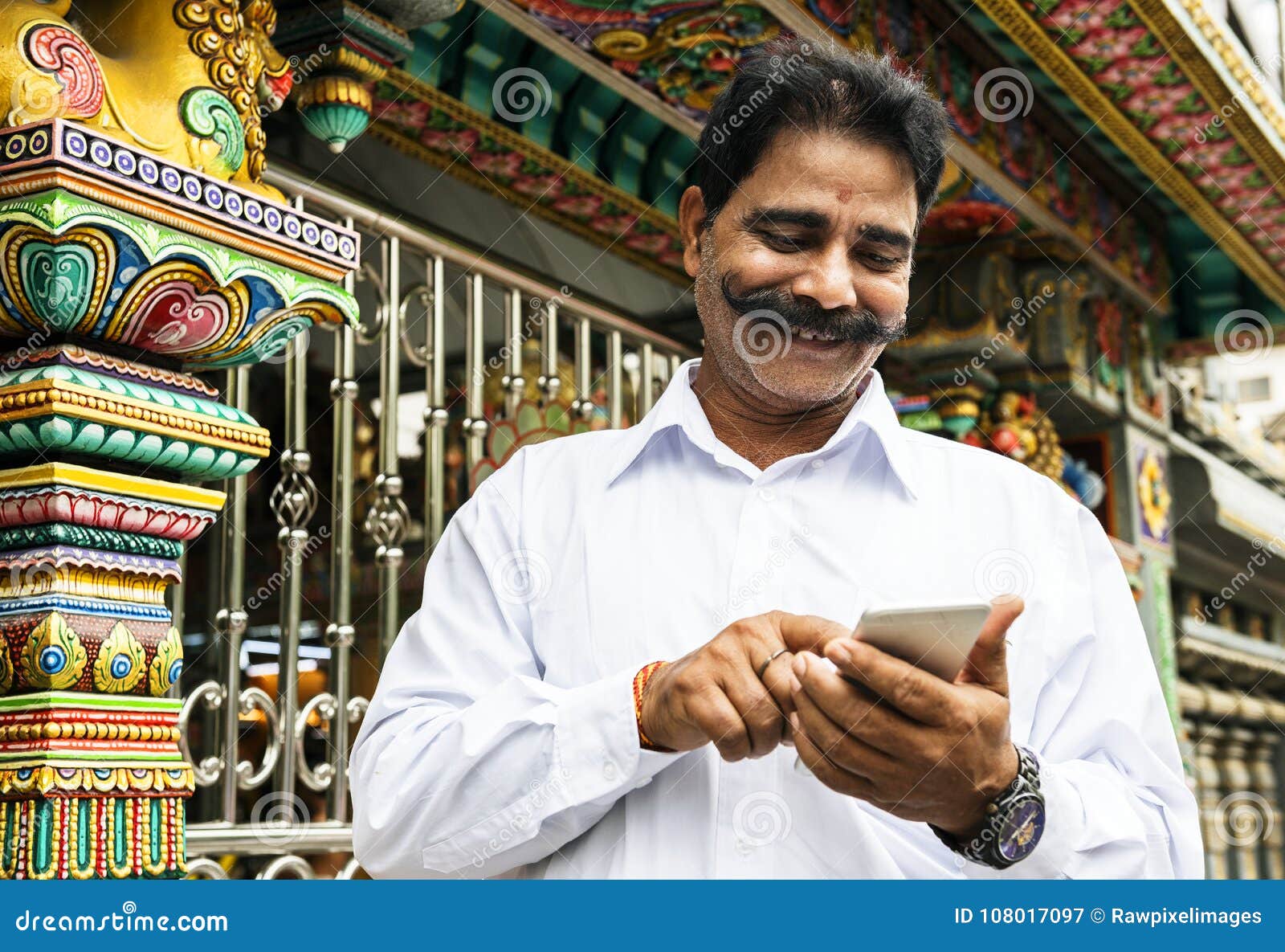 Indian Man Using Mobile Phone Stock Image - Image of bangladeshi, woman ...