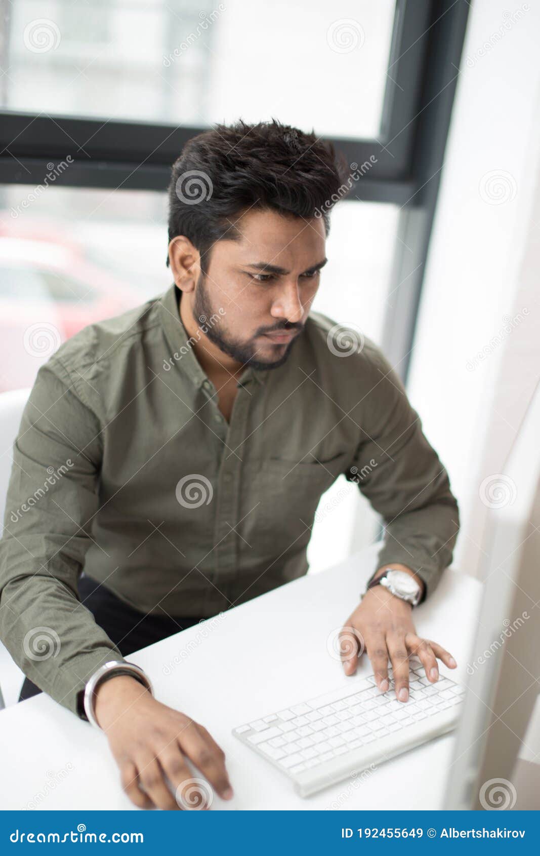 Indian Man Working at Computer from Modern Bright Office Stock Image ...