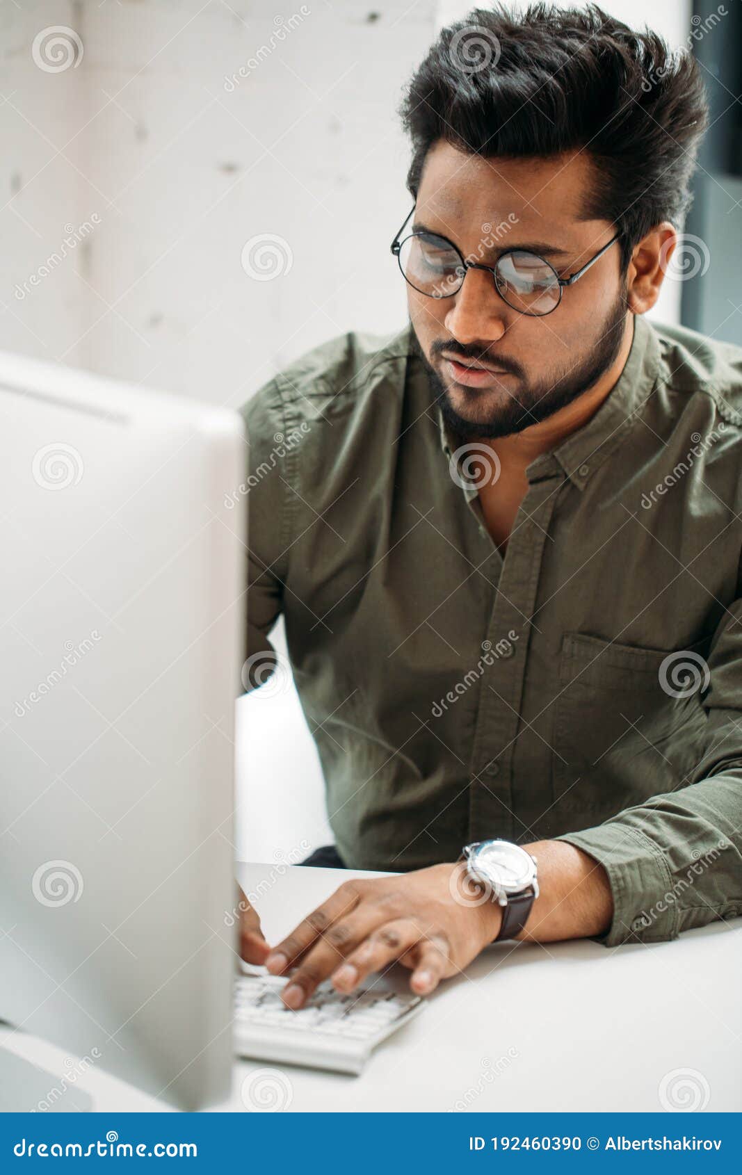 Indian Man Working at Computer from Modern Bright Office Stock Photo ...