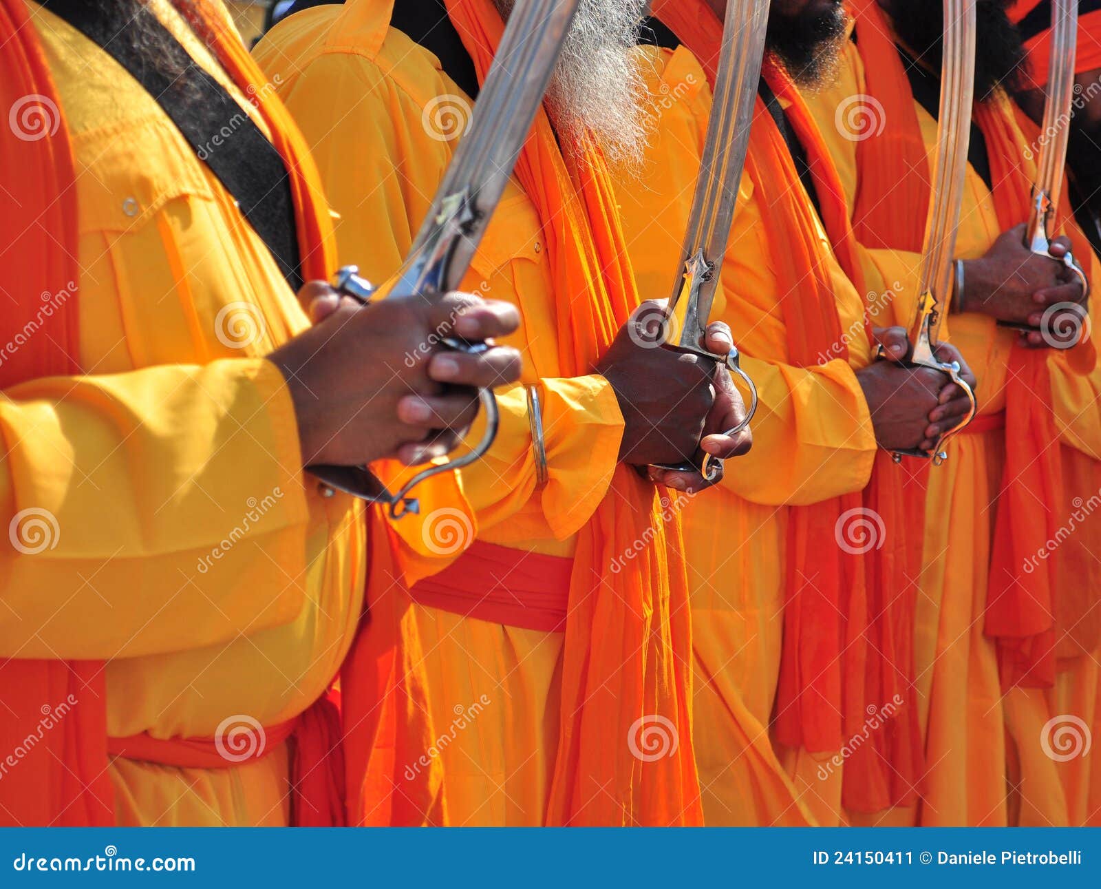 Indian monks stock image. Image of punjabi, sword, orange - 24150411