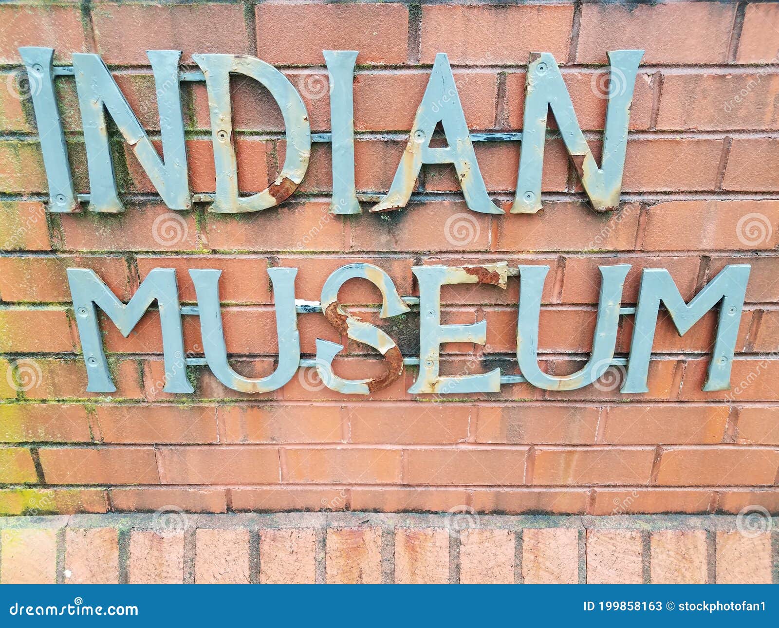 Indian Museum Sign on Red Brick Wall Stock Image - Image of masonry ...