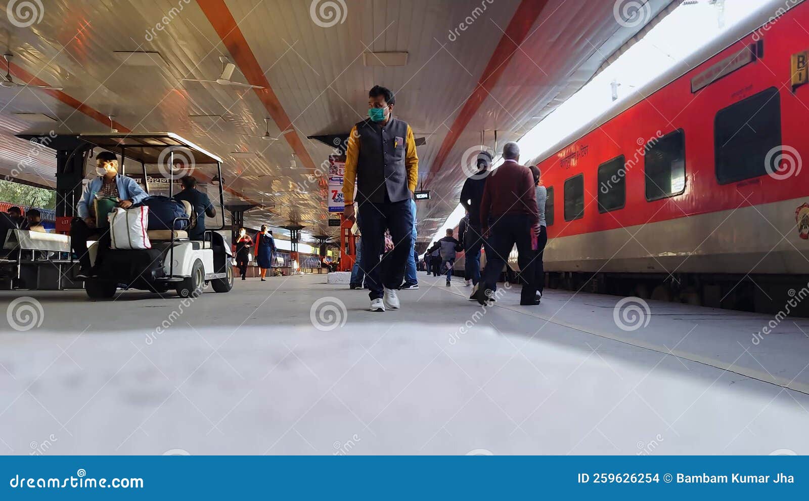 Indian Passenger Train Standing at Station with Passenger Walking at ...
