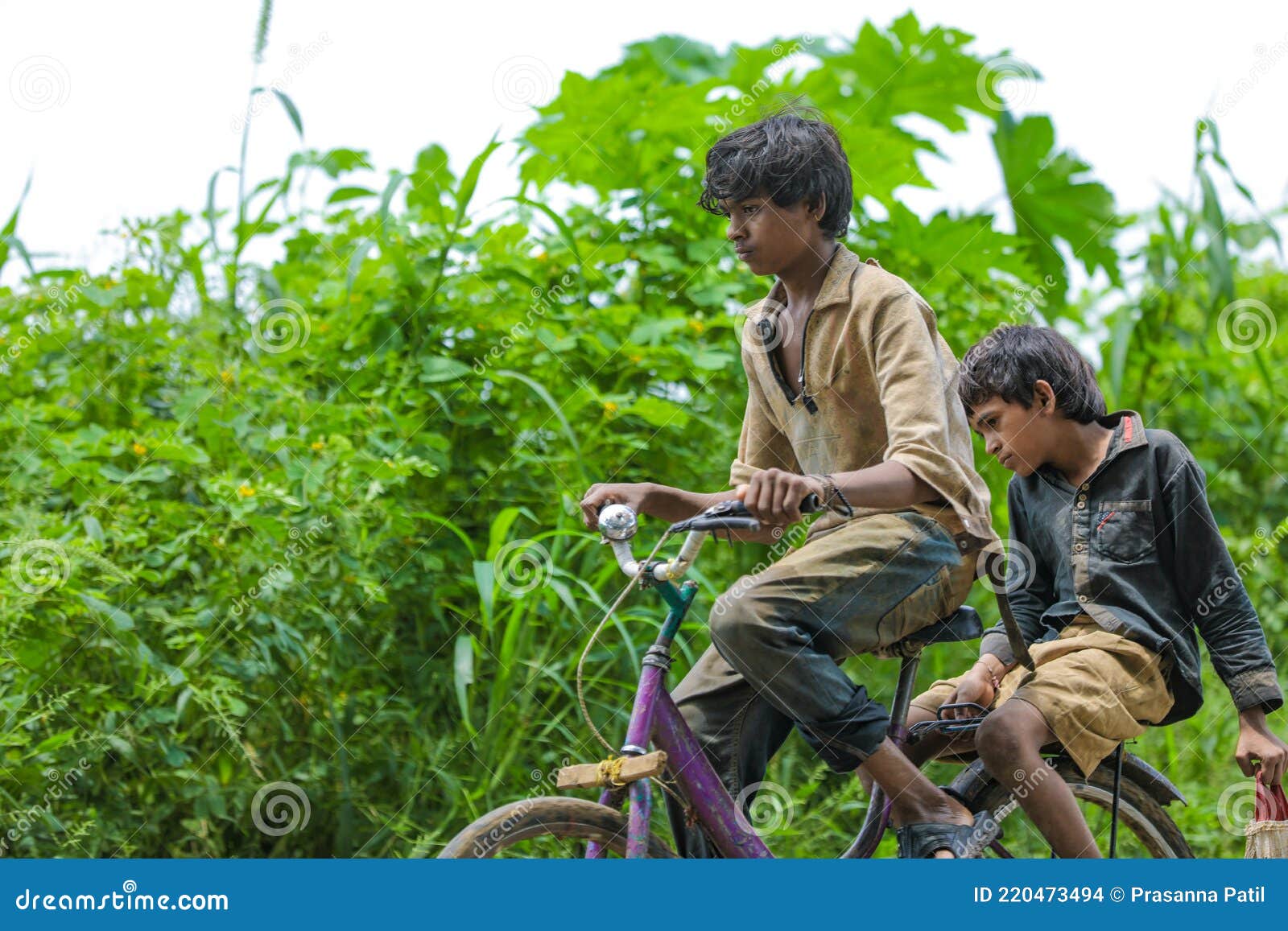 Indian poor child on cycle editorial stock image. Image of joyride ...