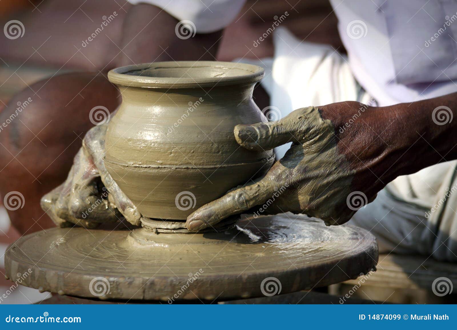 Indian Potter Making Clay Pots On Pottery Wheel In Dharavi Slum At ...