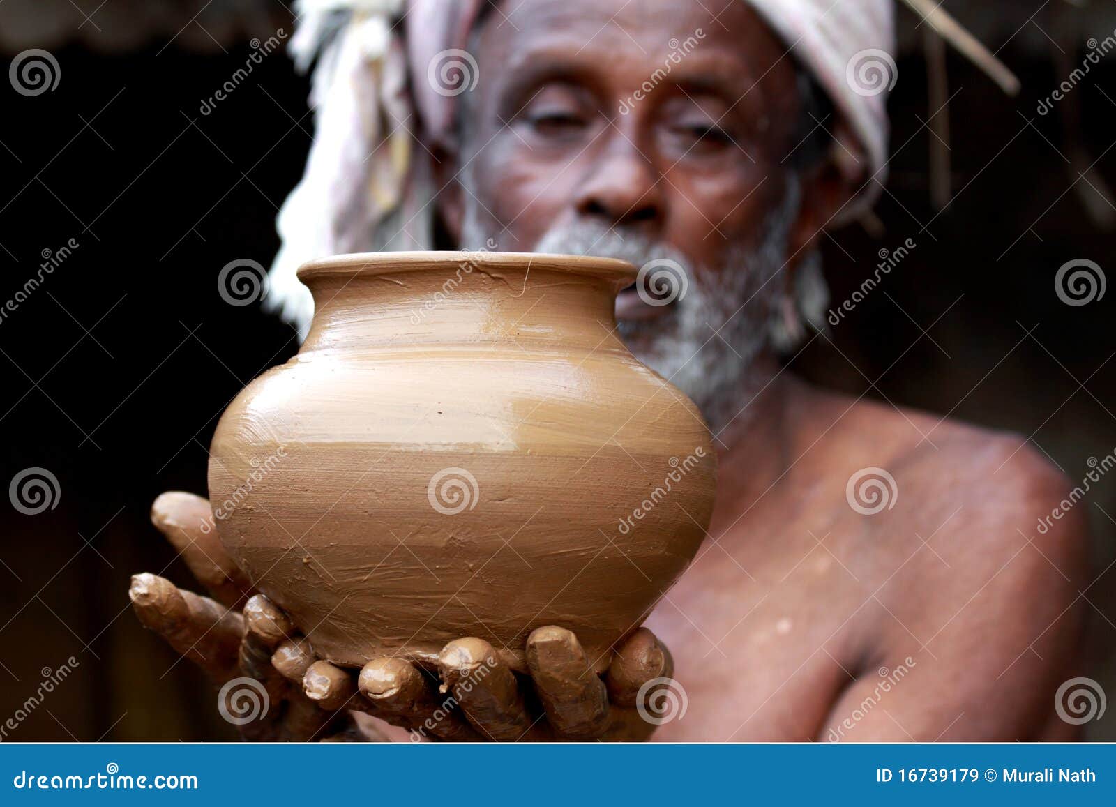 Indian Potter Making Clay Pots On Pottery Wheel In Dharavi Slum At ...