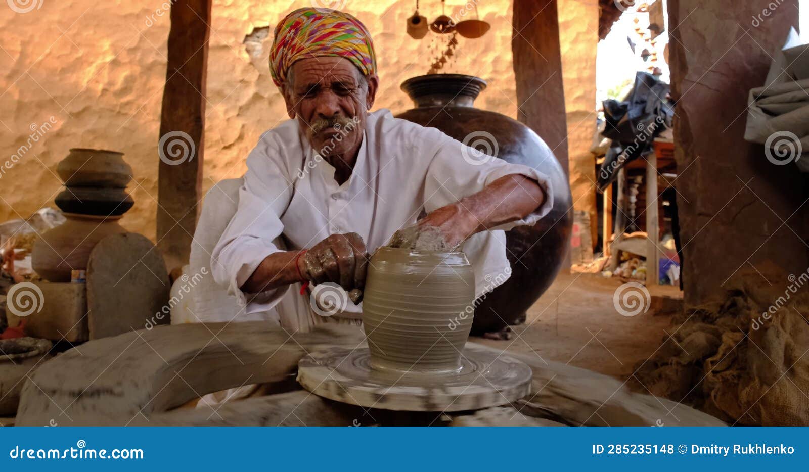 Indian Potter at Work Throwing the Potter S Wheel and Shaping Clay Ware ...