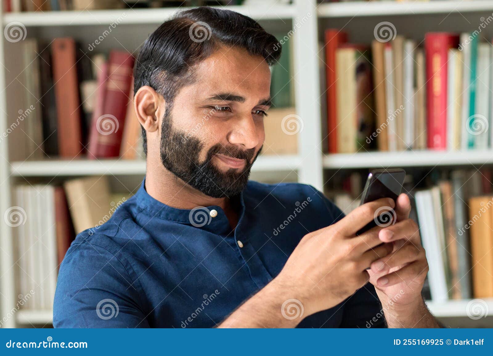 Indian Business Man Holding Smartphone Using Mobile Phone at Home or in ...