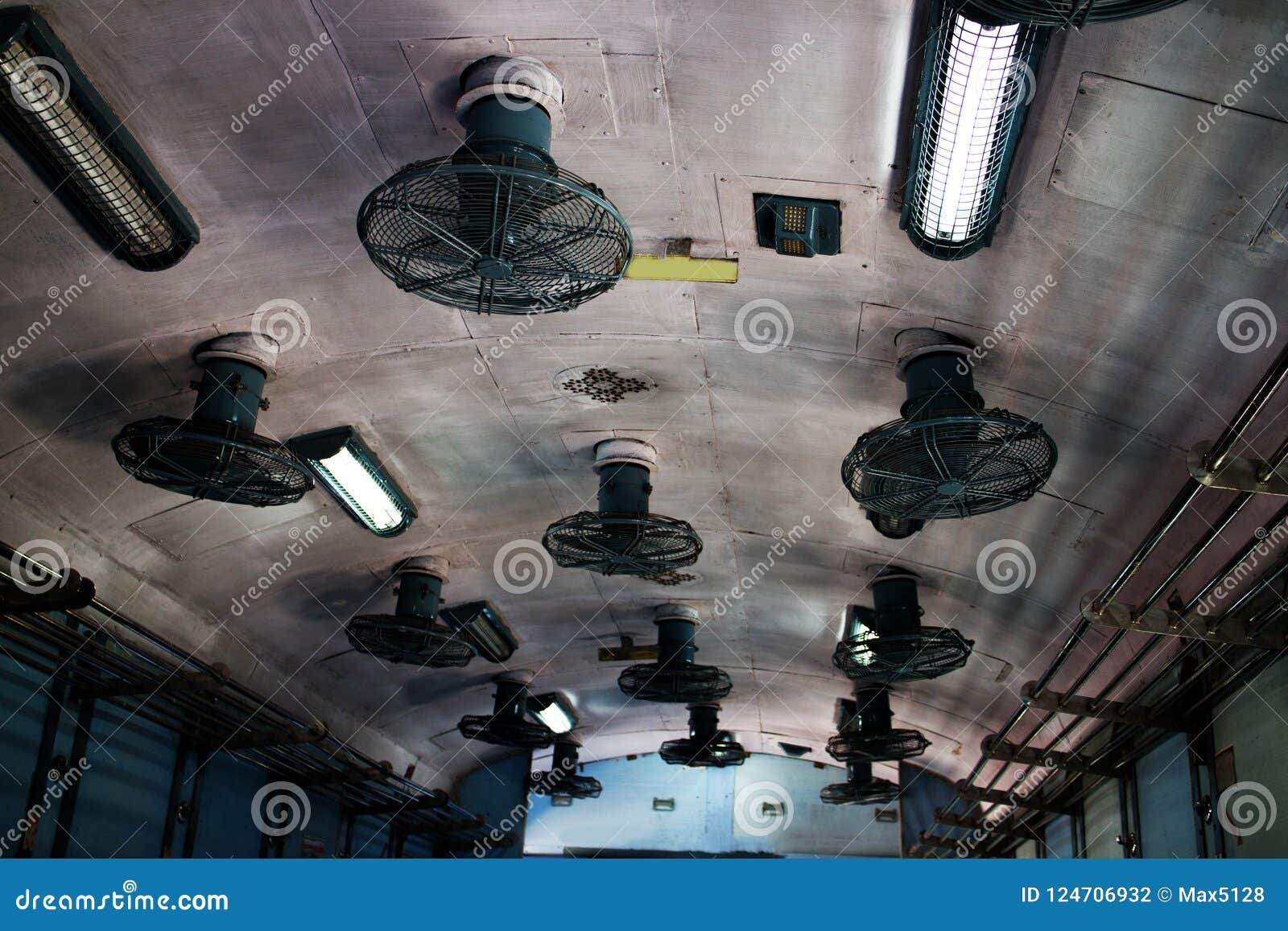 Passenger Car with Lots of Fans on the Ceiling Stock Photo - Image of ...