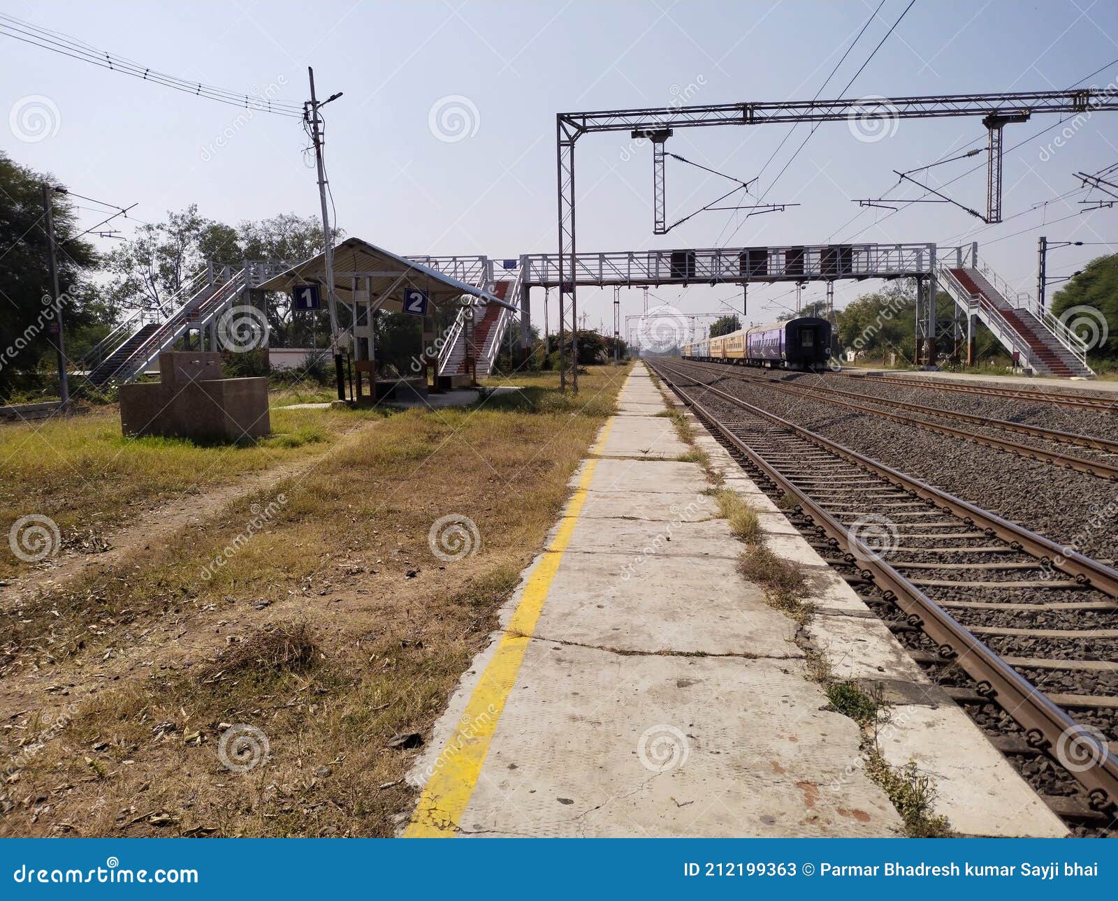 Indian railway platform stock image. Image of infrastructure - 212199363