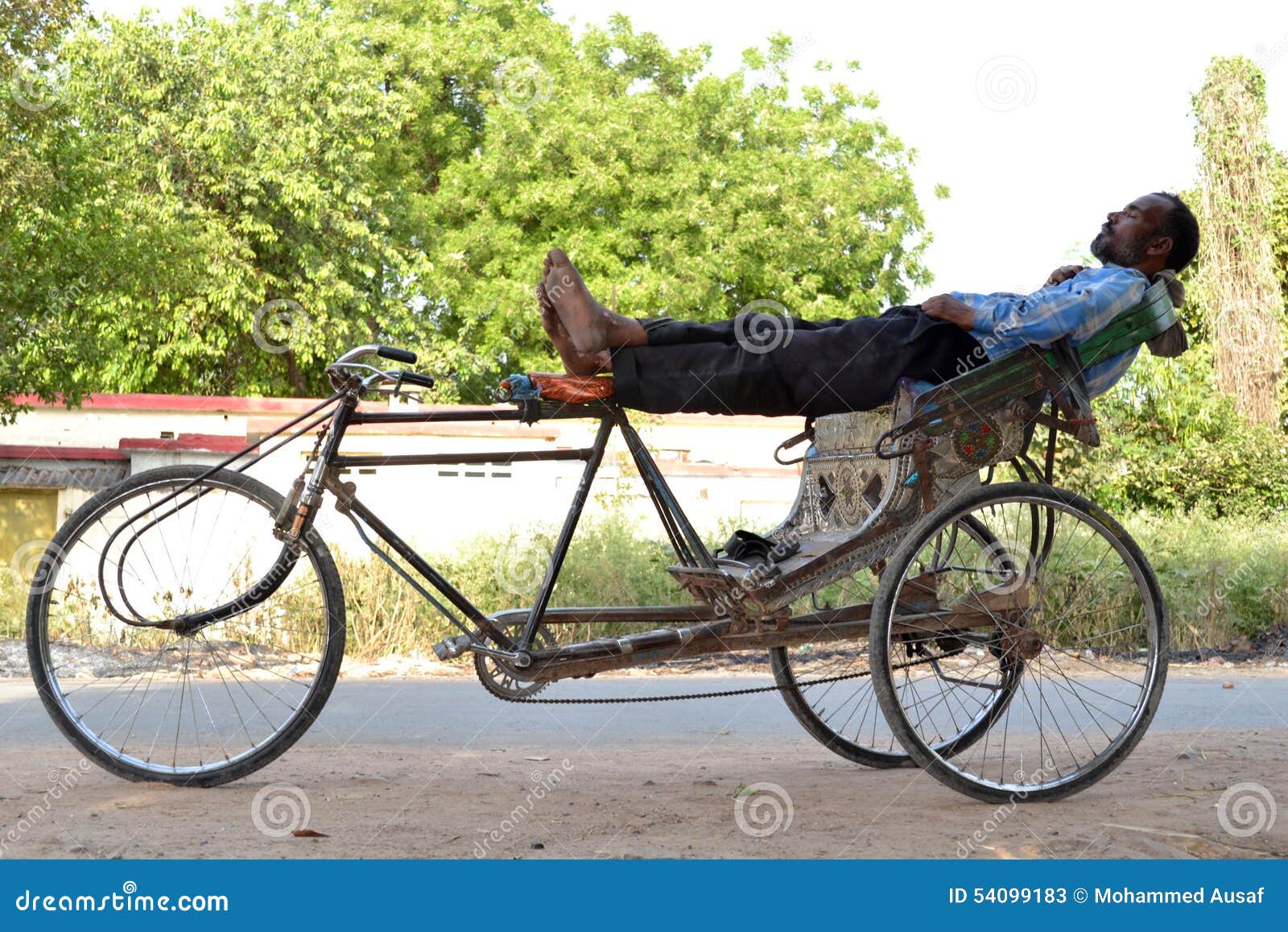 An Indian Rickshaw Puller Resting in Strange Position Editorial Stock ...