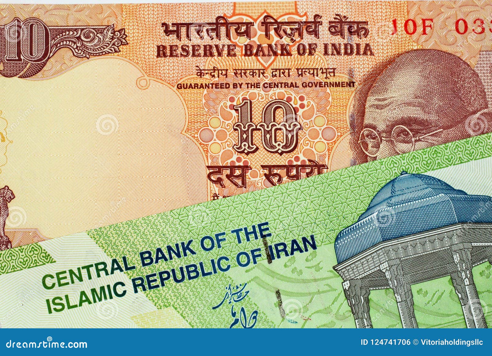An Indian 10 Rupee Note with an Iranian 10000 Rial Bank Note Stock ...