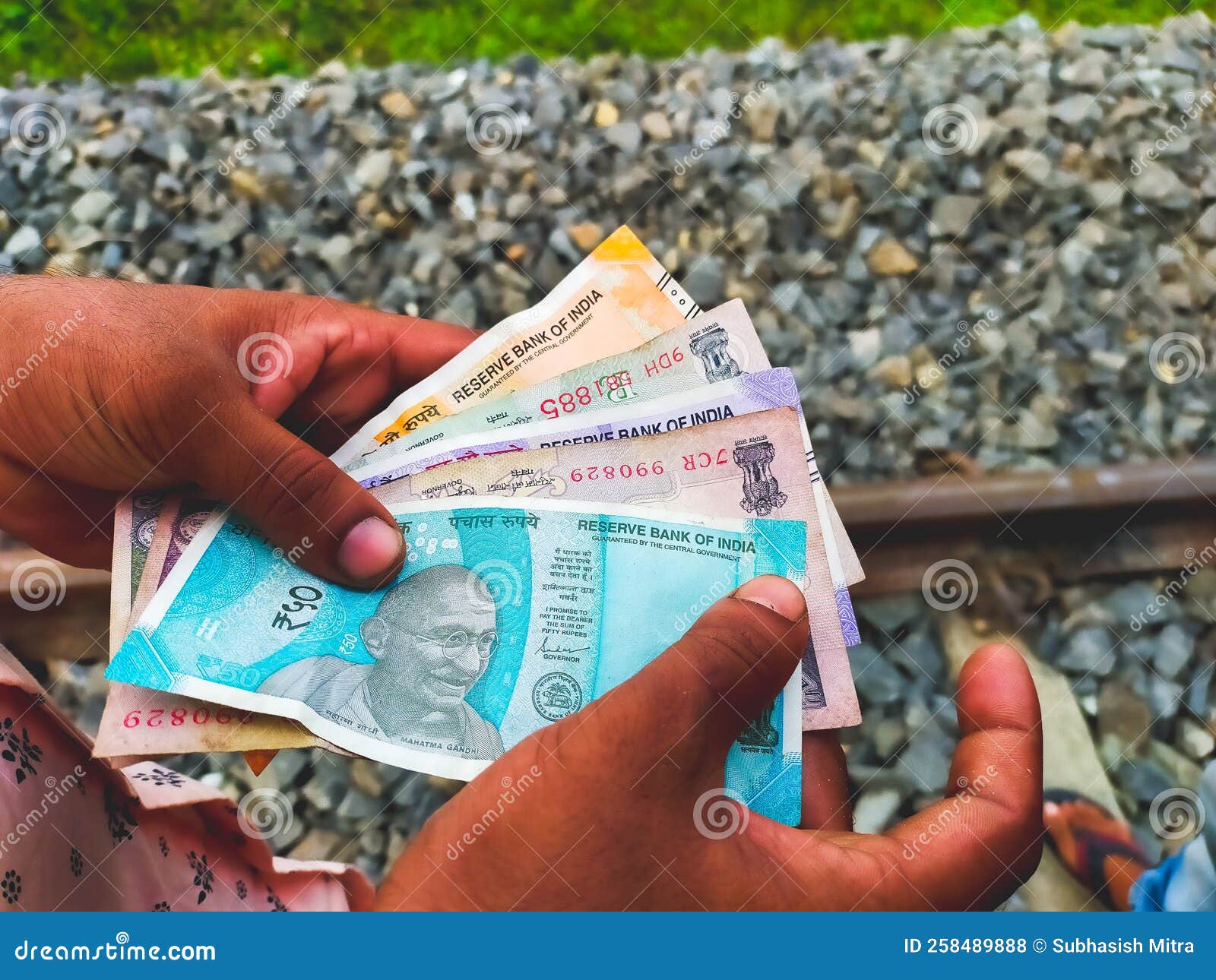 Indian Rupee Notes in Hand. Indian Currency. Two Hundred Rupees, Fifty ...