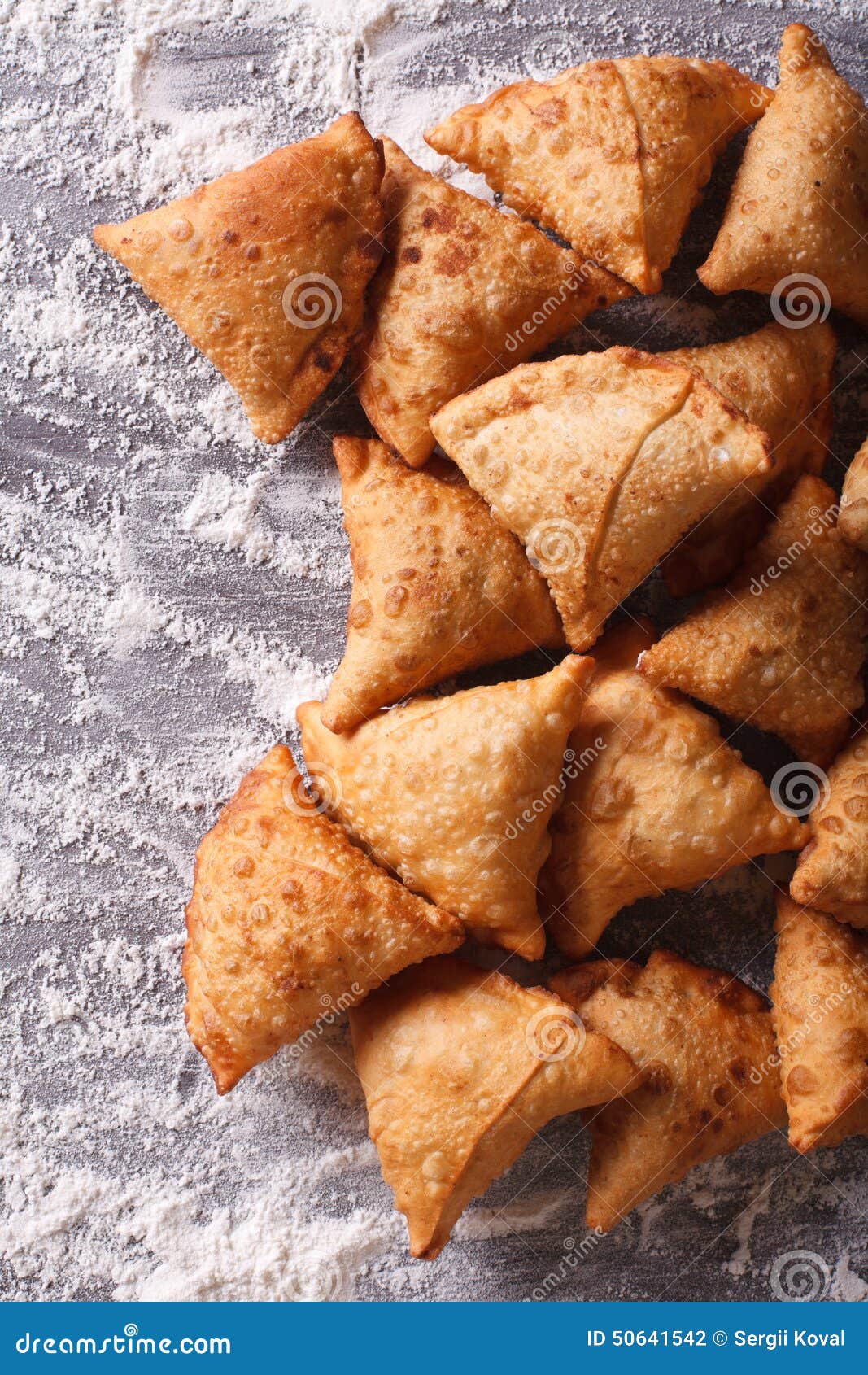 Indian Samosa Pastry on a Floured Table. Vertical Top View Stock Photo ...