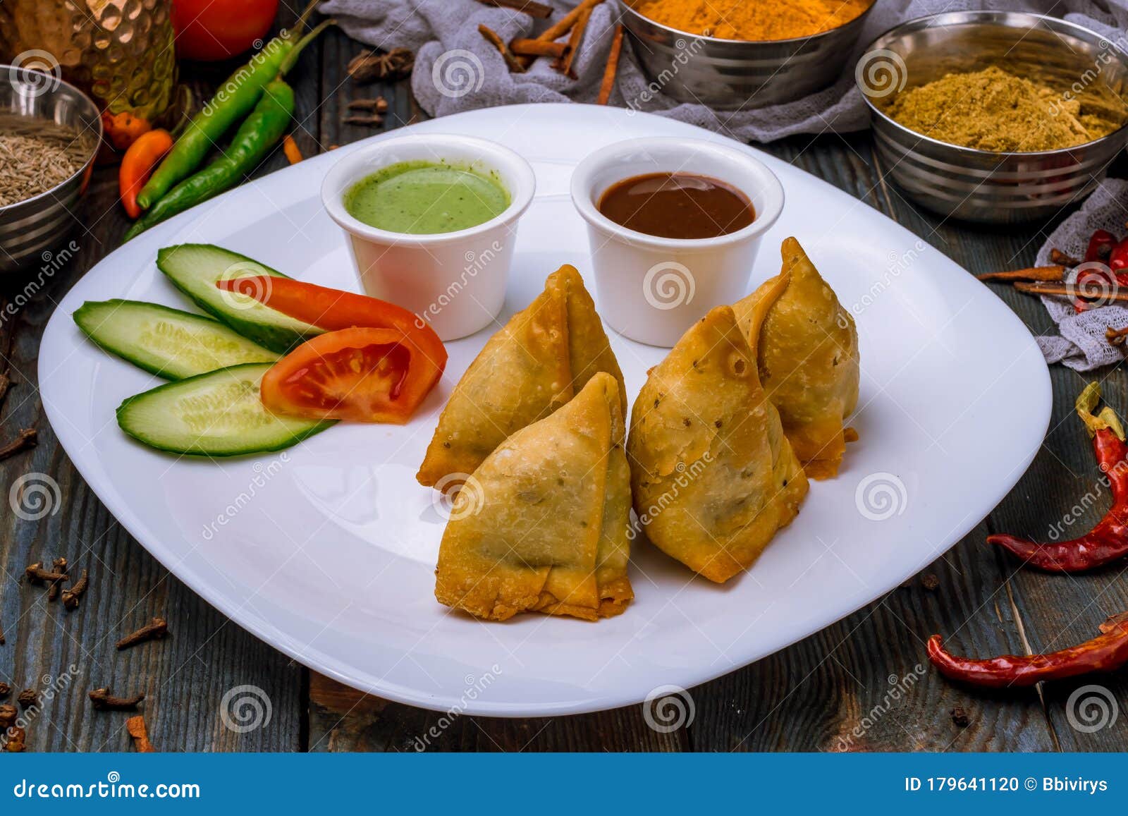 Indian Samosa with Vegetables on Wooden Table Stock Photo - Image of ...