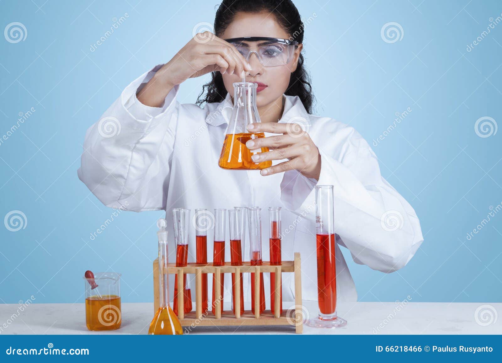Indian Scientist Making Experiment Stock Photo - Image of liquid, adult ...