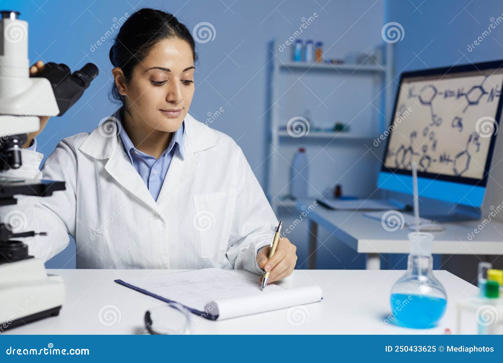 Indian Scientist Making Notes on Research Stock Image - Image of ...