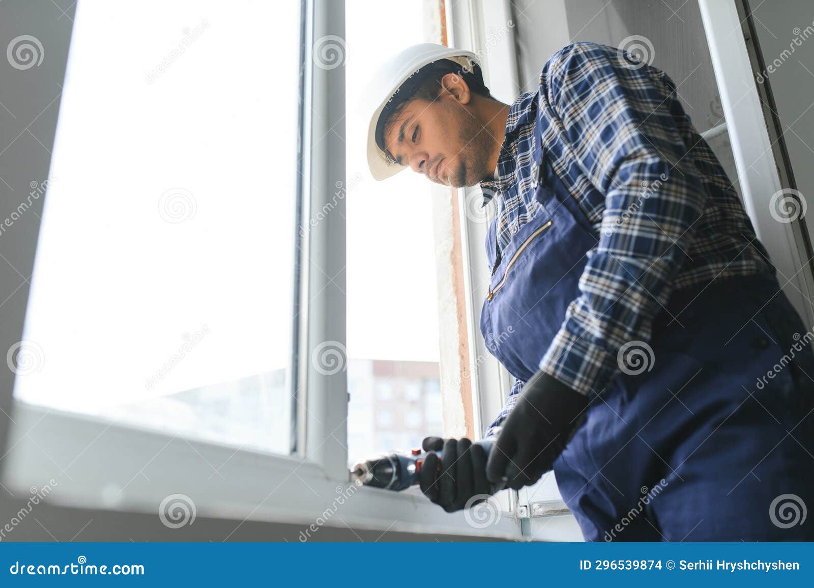 Indian Service Man Installing Window with Screwdriver Stock Photo ...