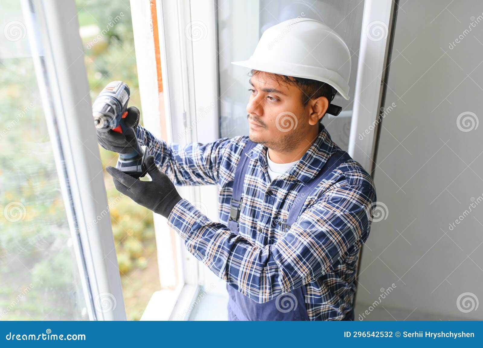 Indian Service Man Installing Window with Screwdriver Stock Photo ...