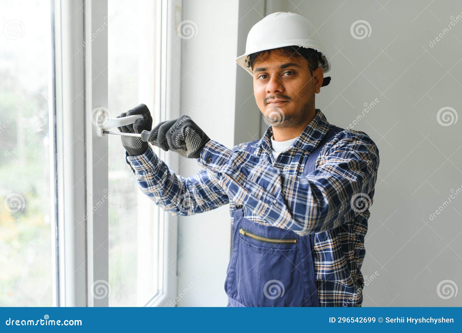 Indian Service Man Installing Window with Screwdriver Stock Image ... Indian Service Man Installing Window with Screwdriver Stock Image ...