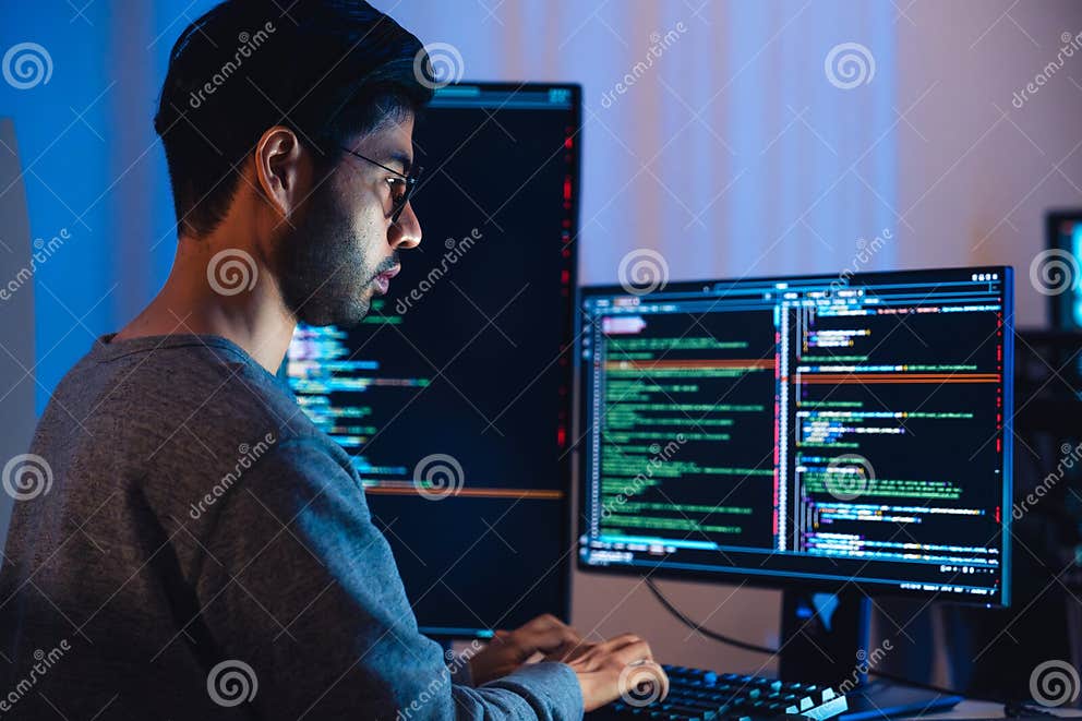 Indian Software Development Working on Coding Computer Screen and Flowchart at Night in Modern ...