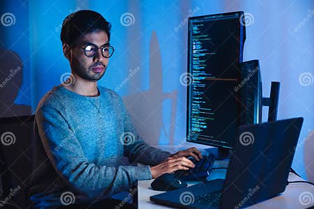 Indian Software Development Working on Coding Computer Screen and Flowchart at Night in Modern ...
