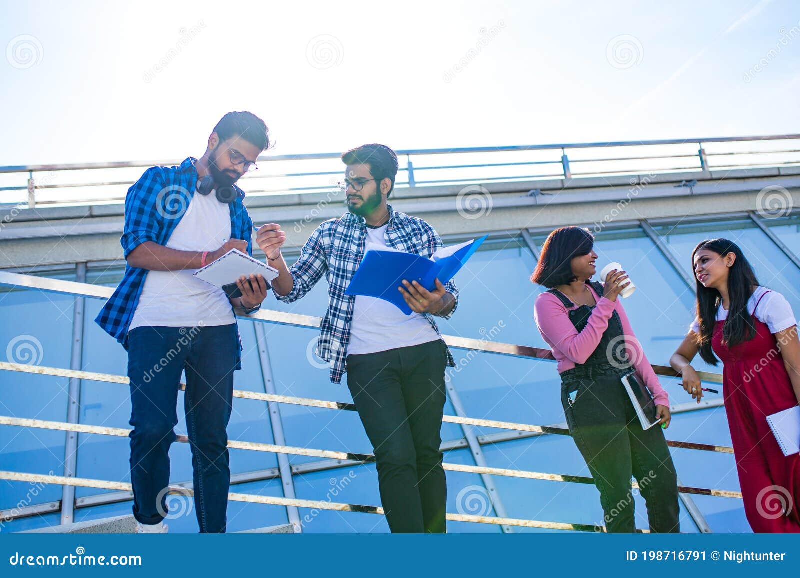 Indian Students Keeping Distance and Do Home Work Outdoors Stock Image ...