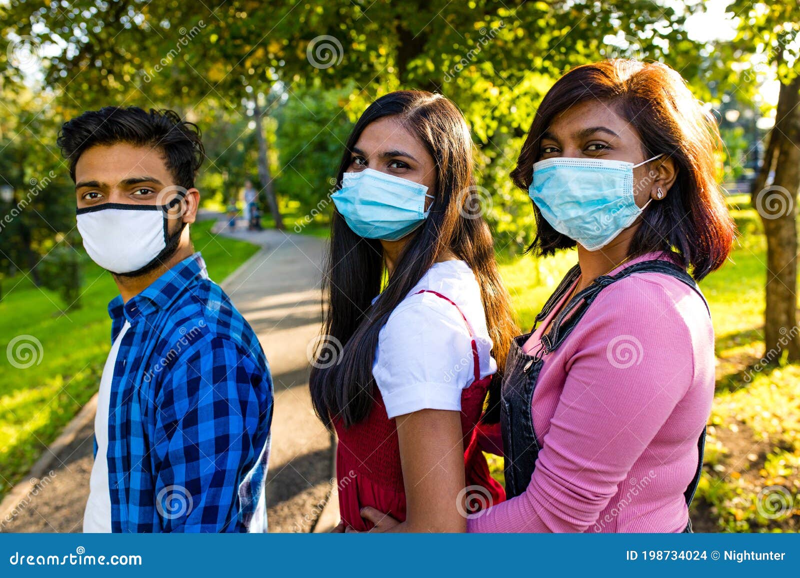 Indian Students Keeping Distance and Do Home Work Outdoors Stock Photo ...