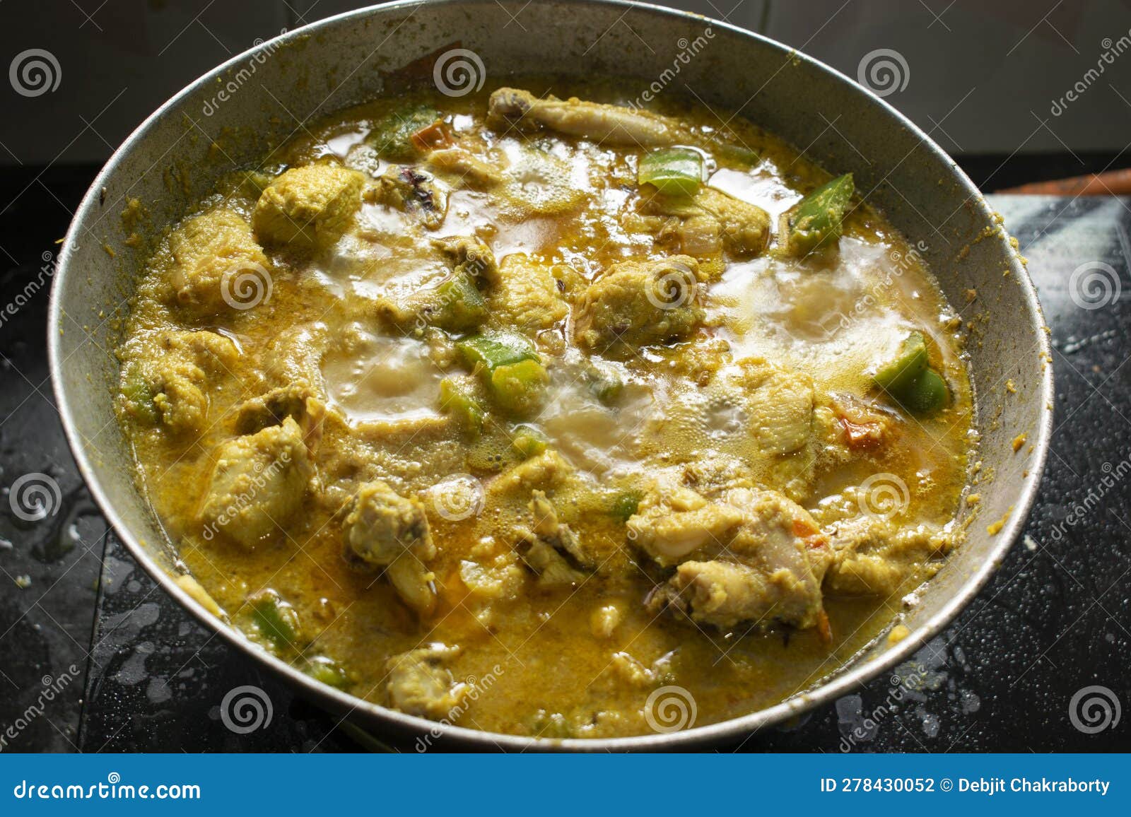 Indian Style Chicken Curry Preparation on a Cauldron Stock Photo ...