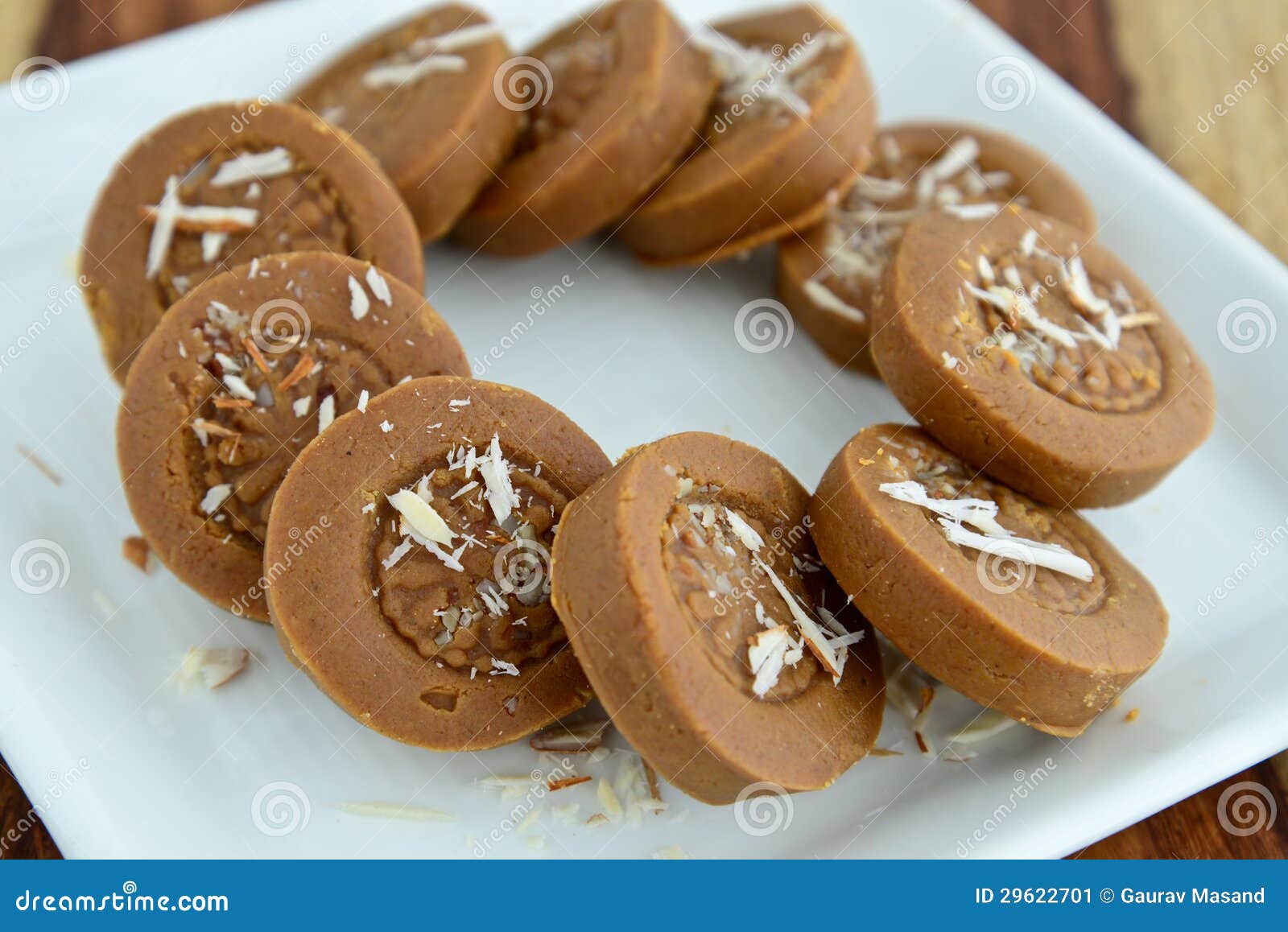 Mathura Ka Peda Is Served On A Clay Plate With Peacock Feather During ...