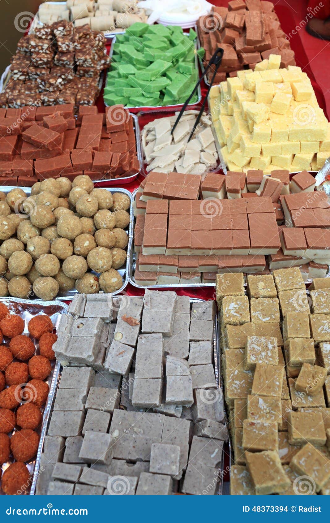 Indian sweets at market stock photo. Image of culture - 48373394