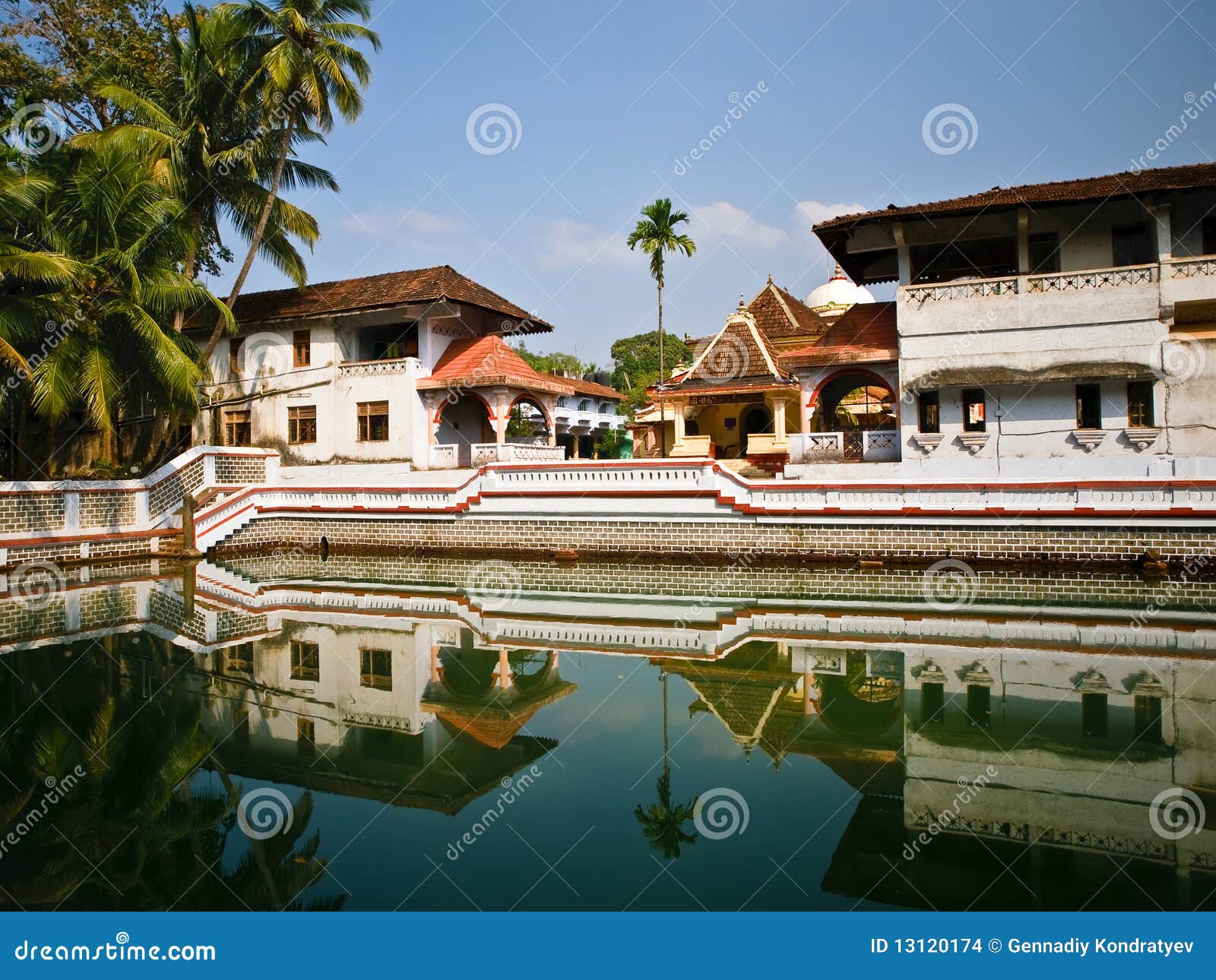 Indian temple near a pond stock photo. Image of sacred - 13120174