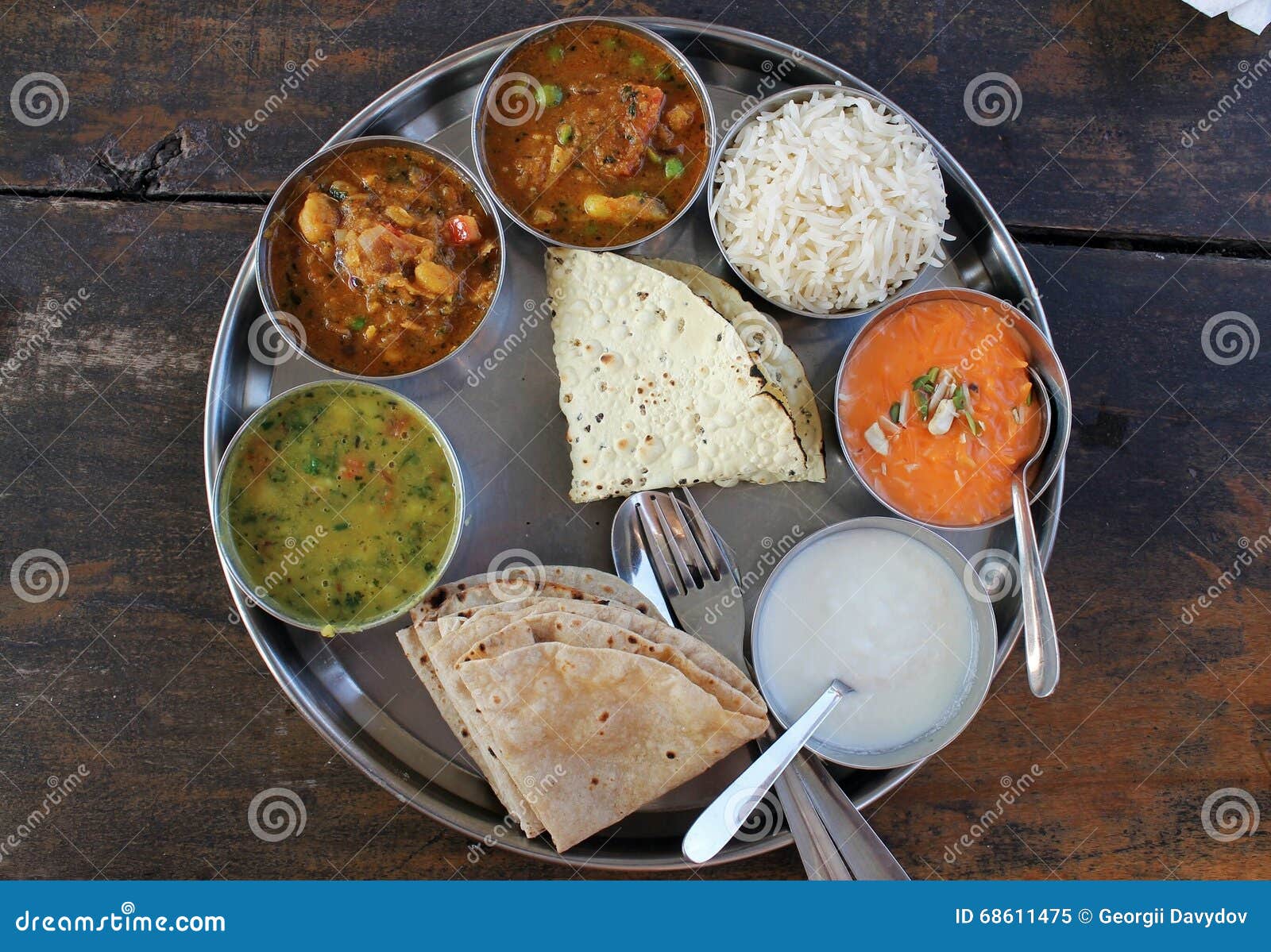Indian thali on the plate stock image. Image of roti - 68611475