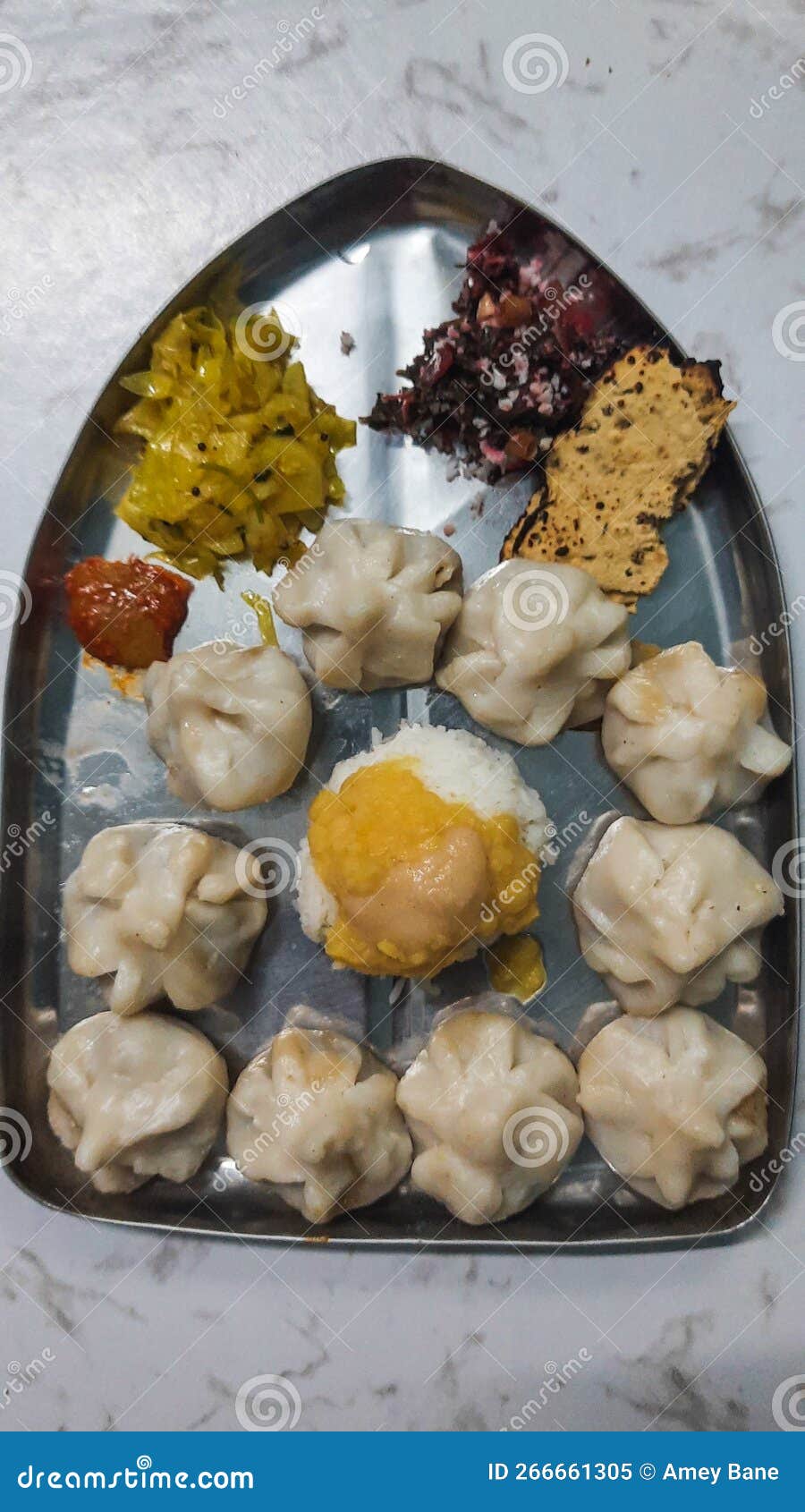 Modak, Maharashtrian Traditional Food, Serve In Steel Plate Stock Photo ...