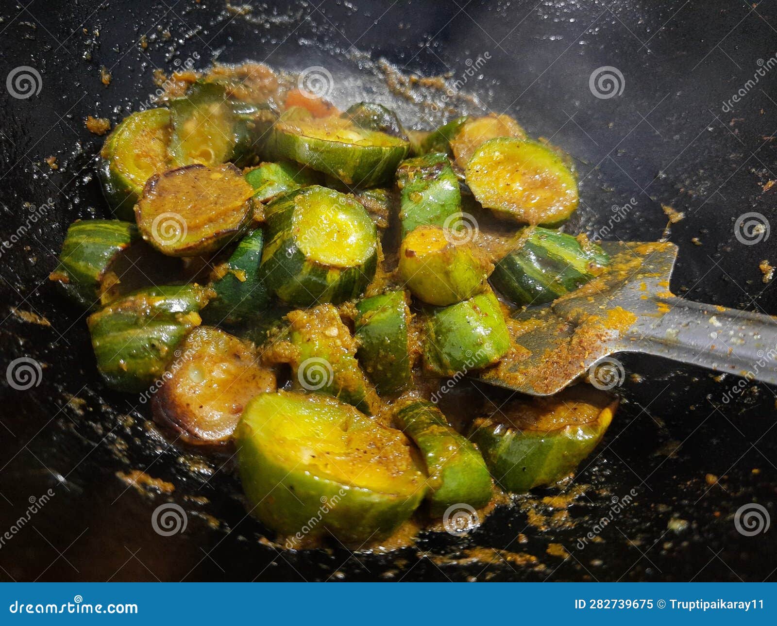 Indian Village Cooking. Pointed Gourds Curry in Making Stock Image ...
