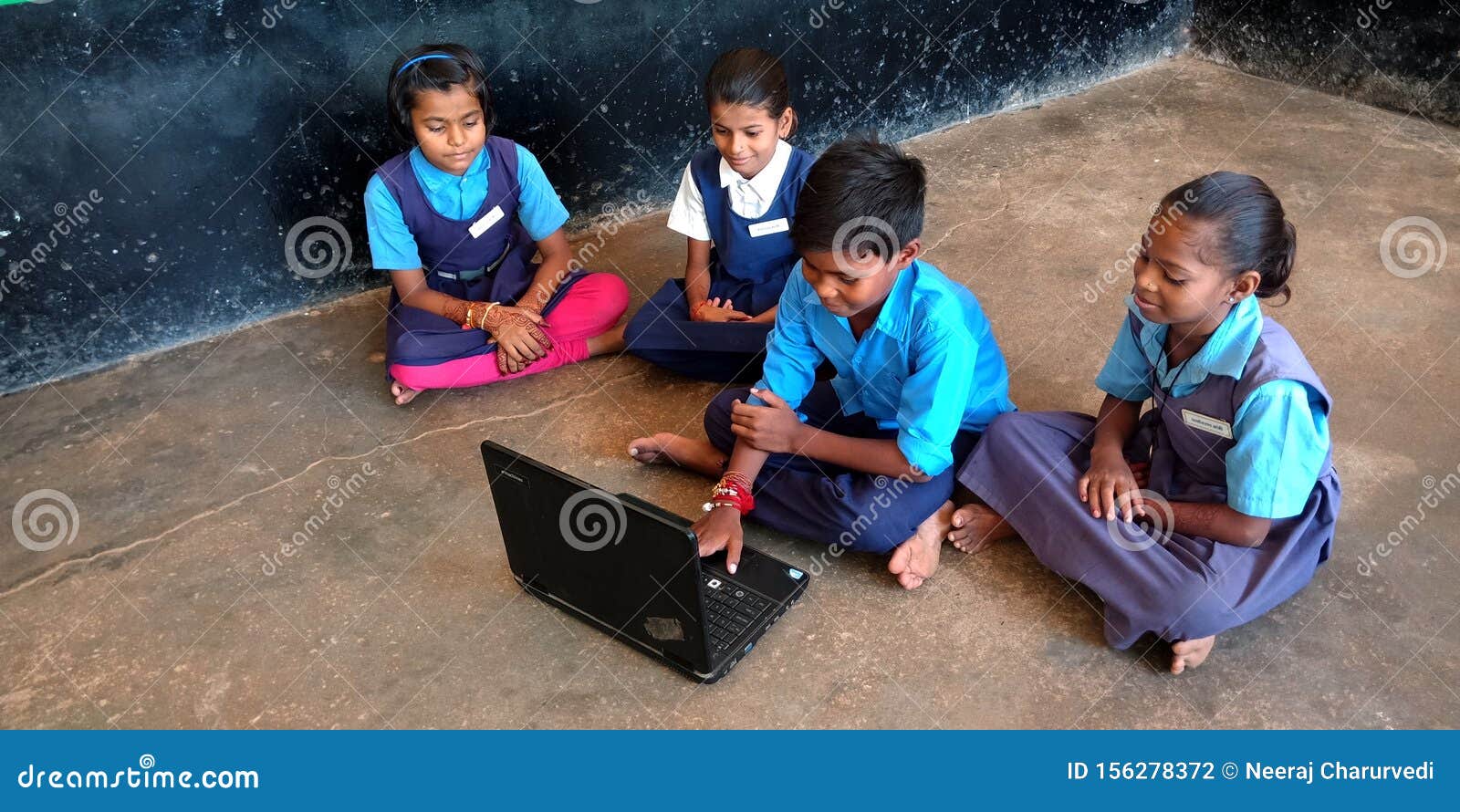 An Indian Village School Students Operating Laptop in the Classroom ...