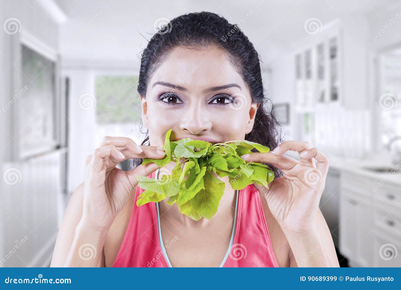 Indian Woman Eating Raw Spinach At Home Stock Image Image Of