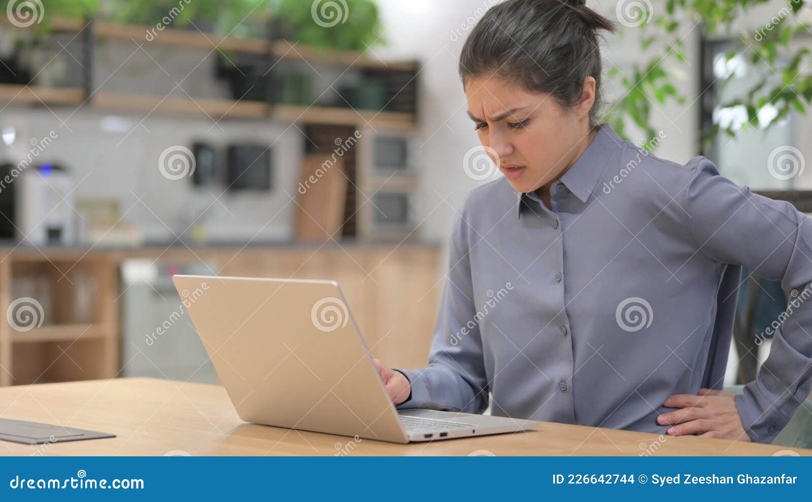 Indian Woman Having Back Pain while Using Laptop Stock Photo - Image of ...