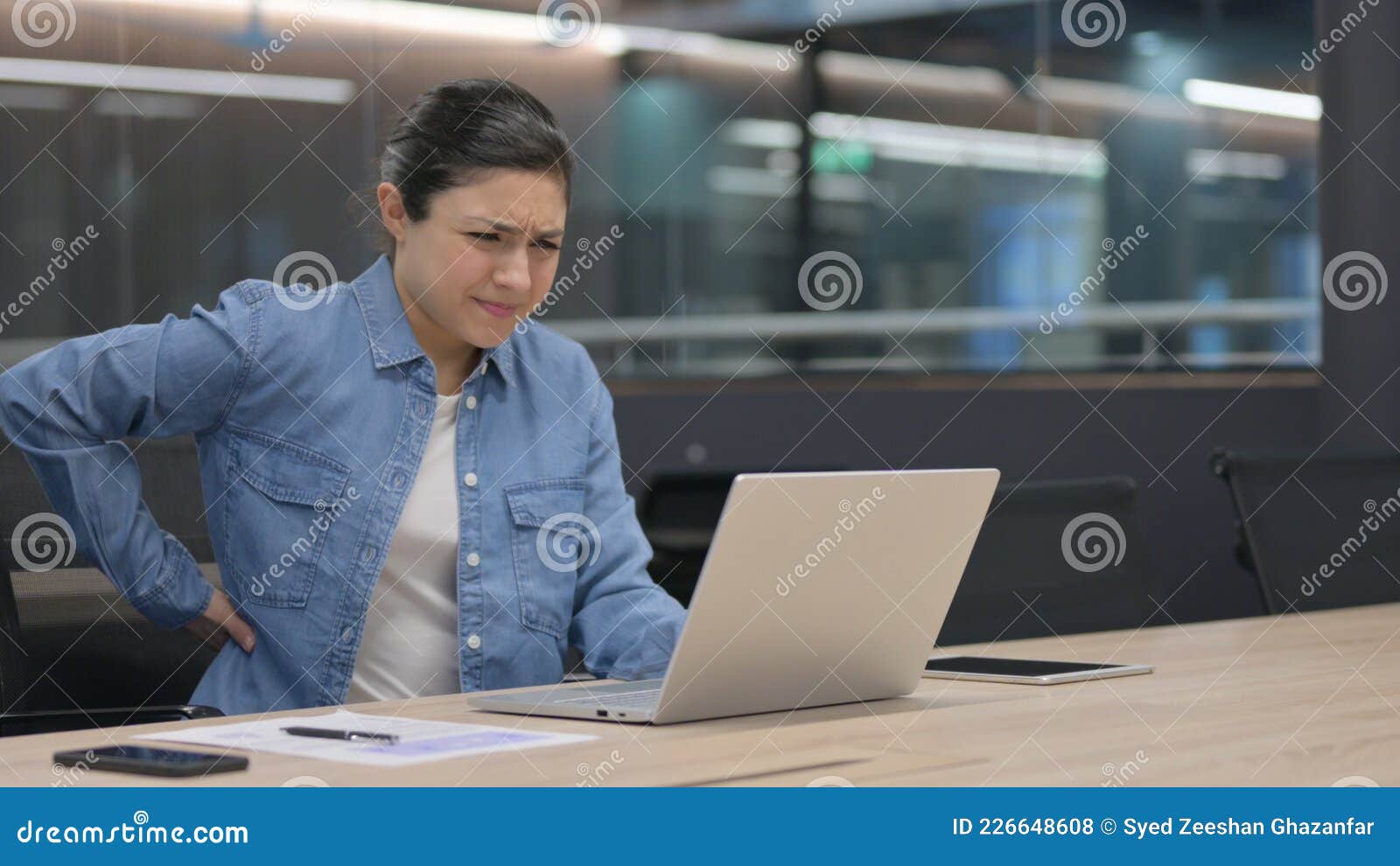 Indian Woman Having Back Pain while Using Laptop Stock Photo - Image of ...