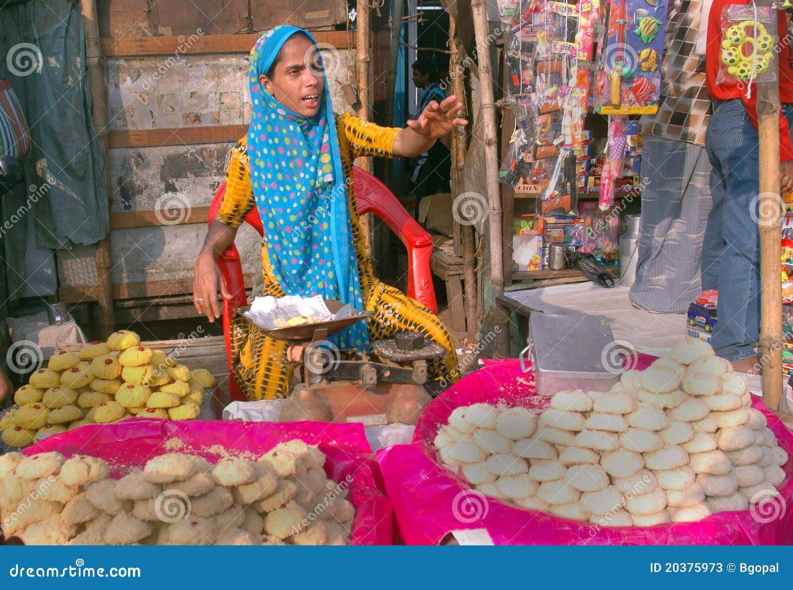Indian woman seller editorial stock photo. Image of items - 20375973