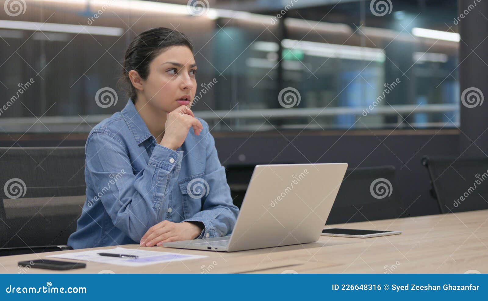 Indian Woman Thinking while Using Laptop Stock Photo - Image of ...