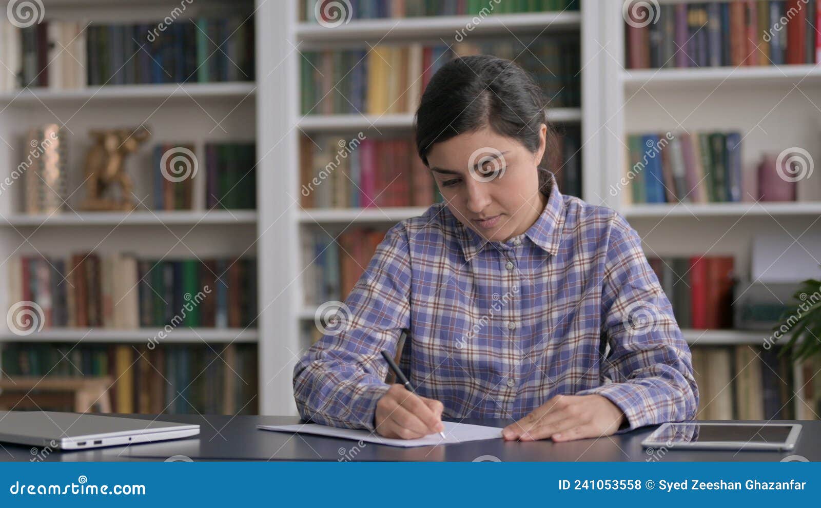 Indian Woman Writing on Paper in Office Stock Photo - Image of diary ...