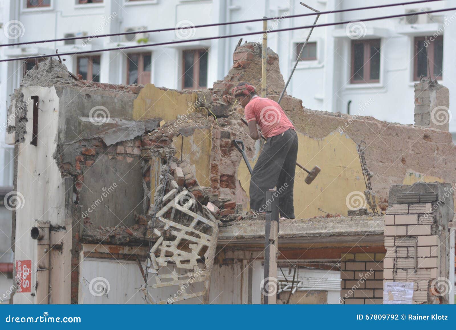 Destroying Old House Using Bucket Excavator On Construction Site ...