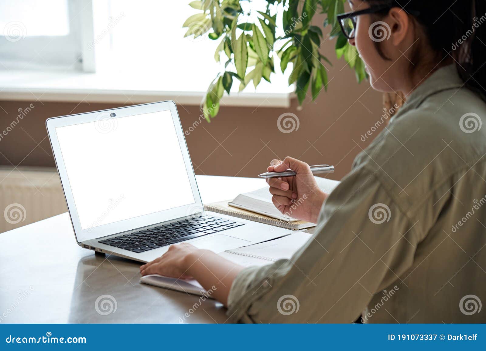 Indian Female Student Elearning on Laptop. Over Shoulder Mock Up Screen ...